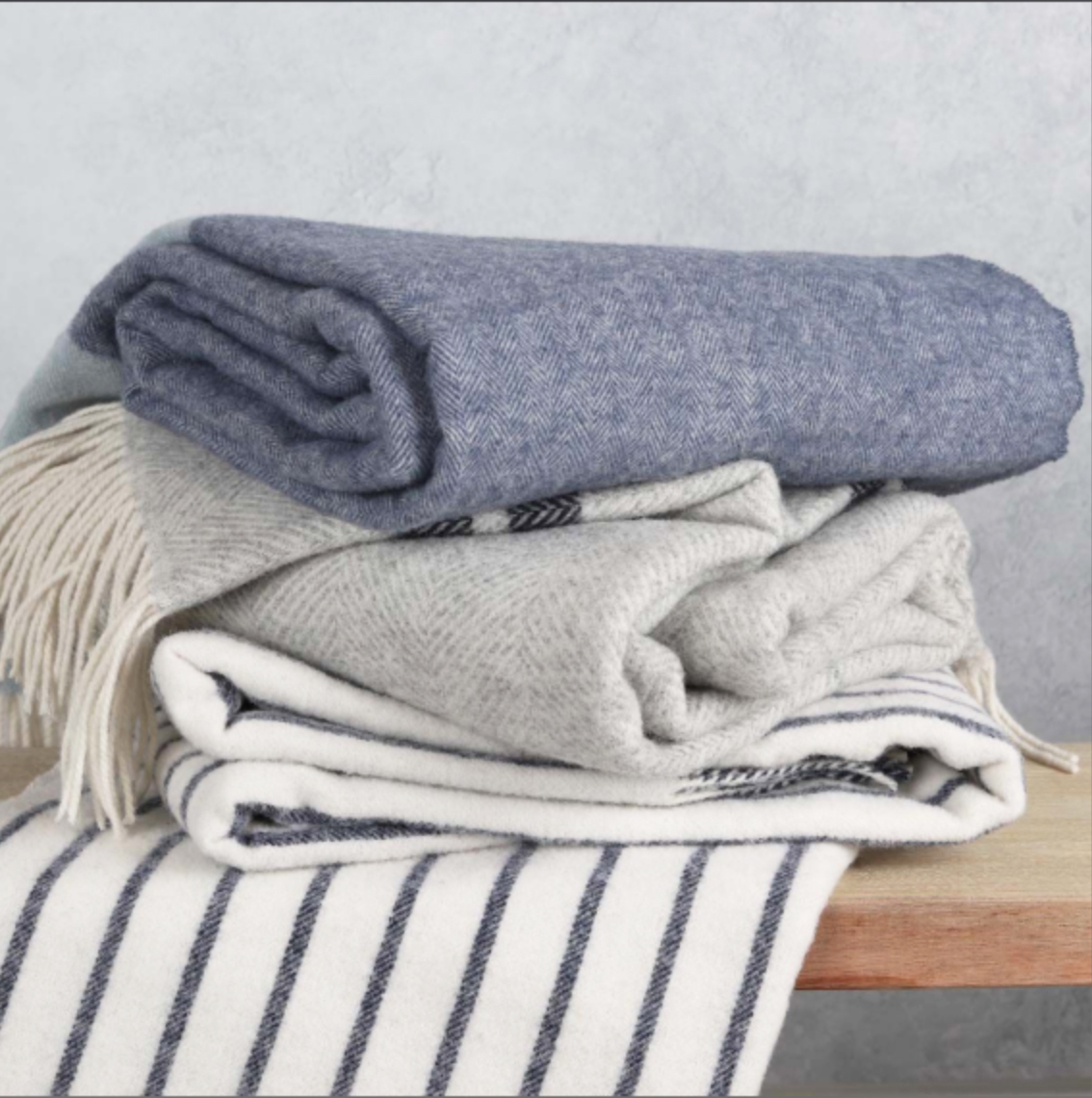 Sudbury blue and white wool throws from The White Lighthouse Furniture